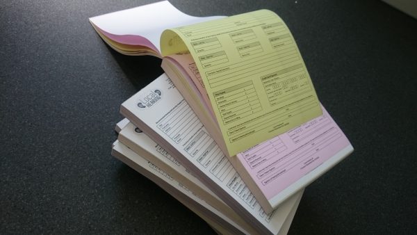 NCR Invoice Pads, complete with personalized self inking stamp ...